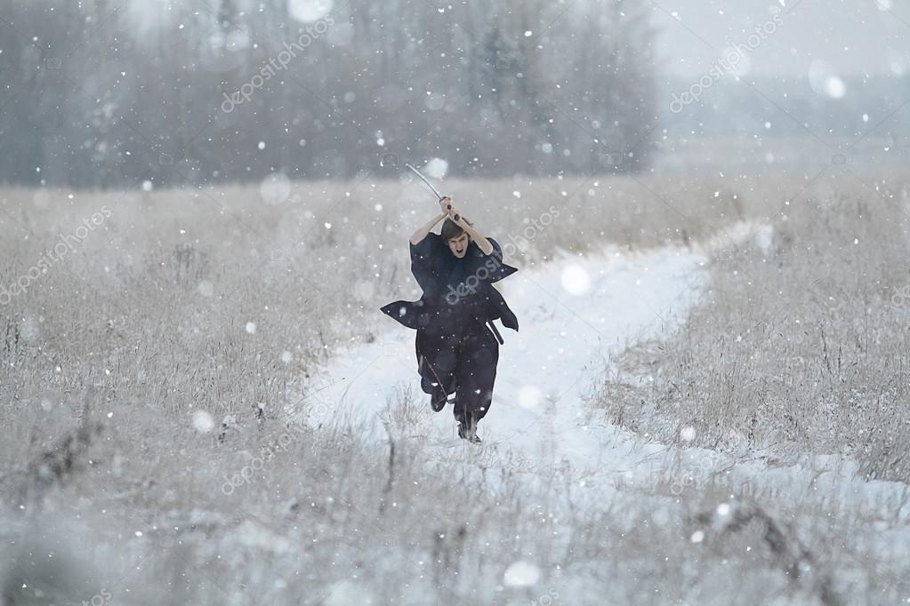 Running samurai in winter field Stock Photo by ©xload 67741285