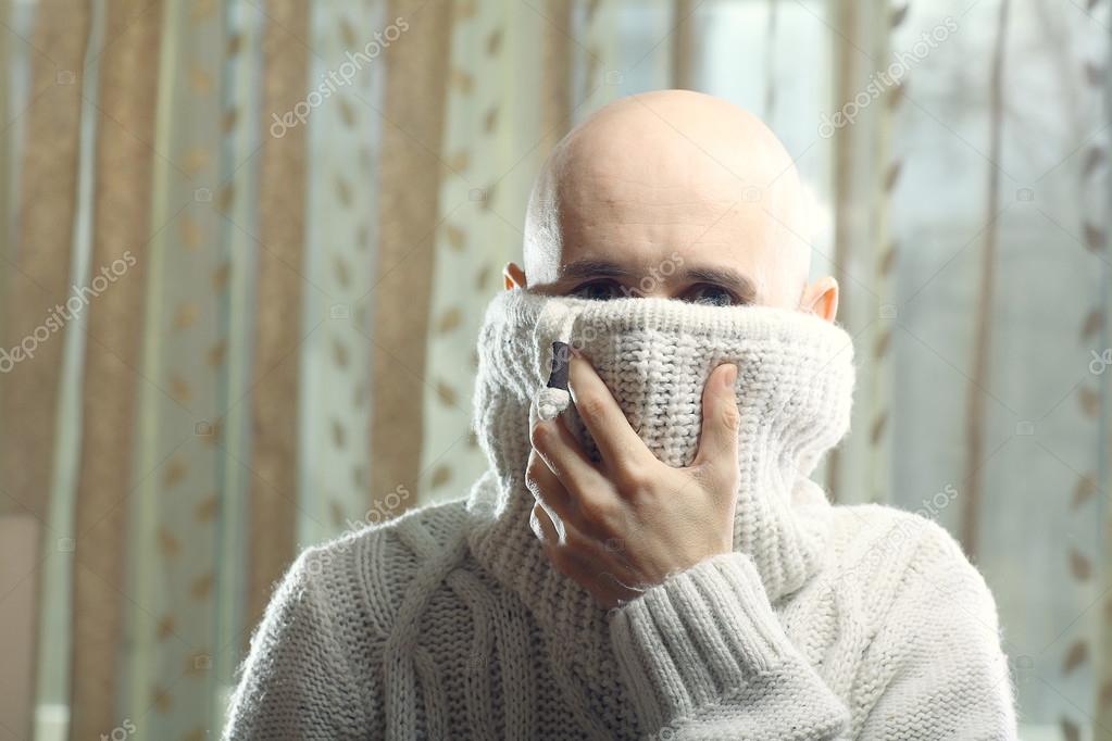Handsome man in a sweater Stock Photo by ©xload 76750891