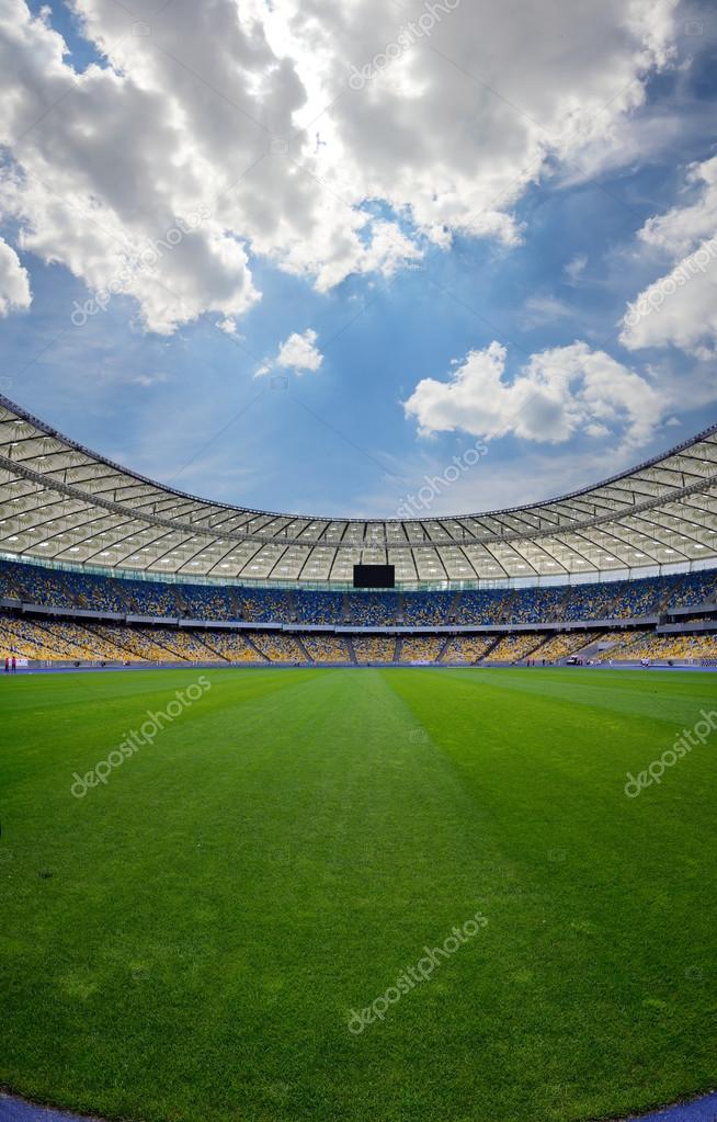 Green grass on stadium Stock Photo by ©mike_kiev 112409670