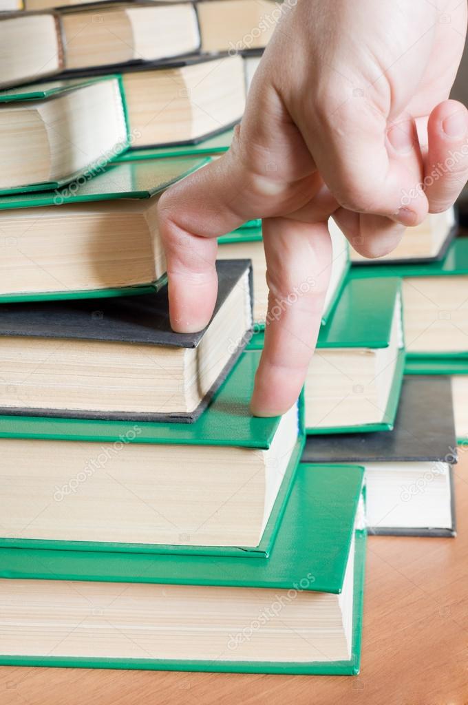 Hand on the books. Stock Photo by ©TinaJeans 59164915