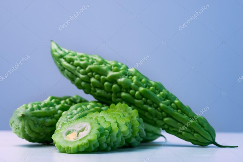 Karela bitter melon caraili studio close up blue background Stock Photo ...