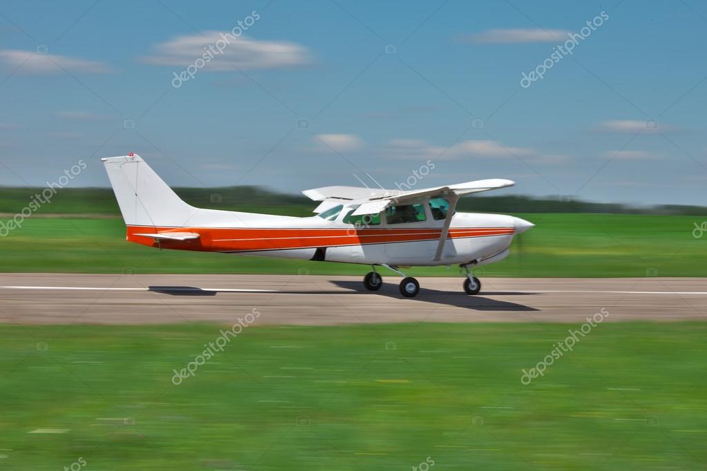 Light plane takeoff Stock Photo by ©dragunov 110864826