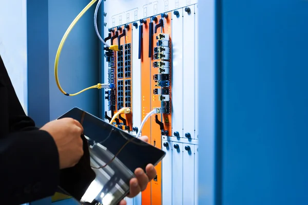 People fix core switch in network room Stock Photo by ©cookiecutter ...