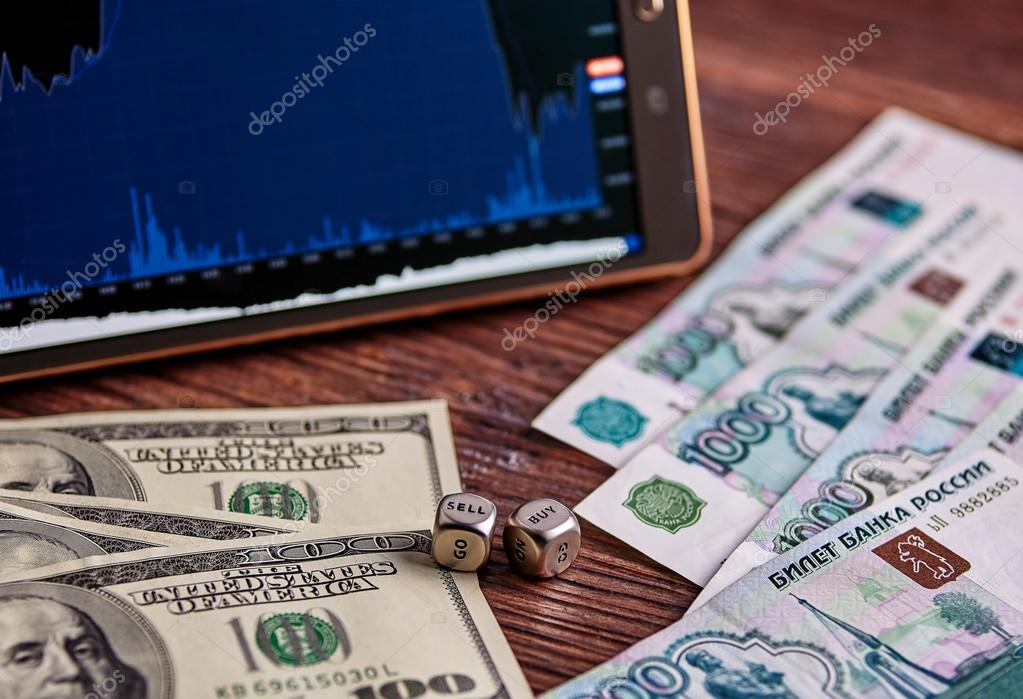 USD, Russian rouble banknotes, dices cubes, financial chart, tab ...