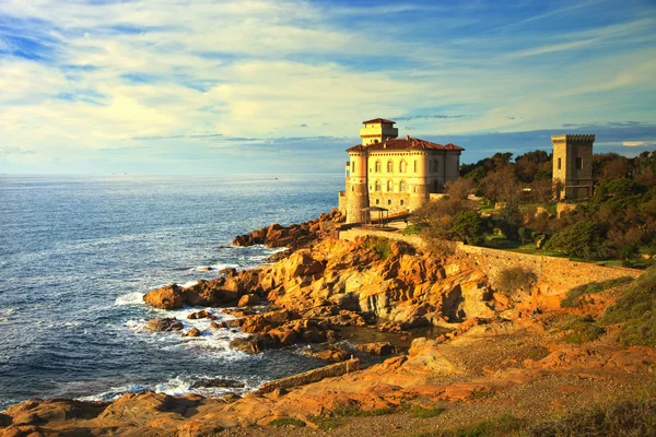 Boccale castle landmark on cliff rock and sea. Tuscany, Italy. Long ...