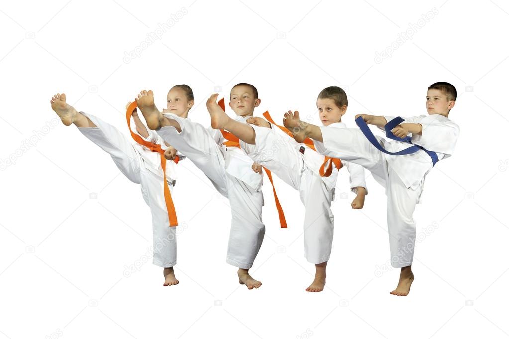 The four athlete are beating kicking on a white background isolated ...