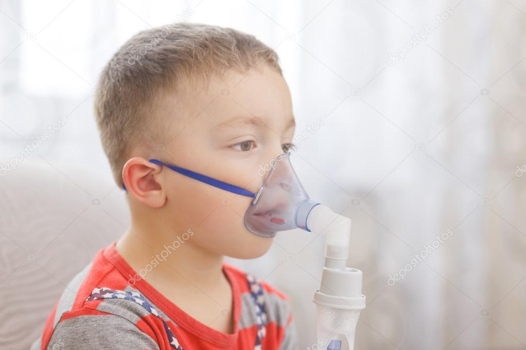 Small boy does therapeutic inhalation Stock Photo by ©Aksakal 109868830