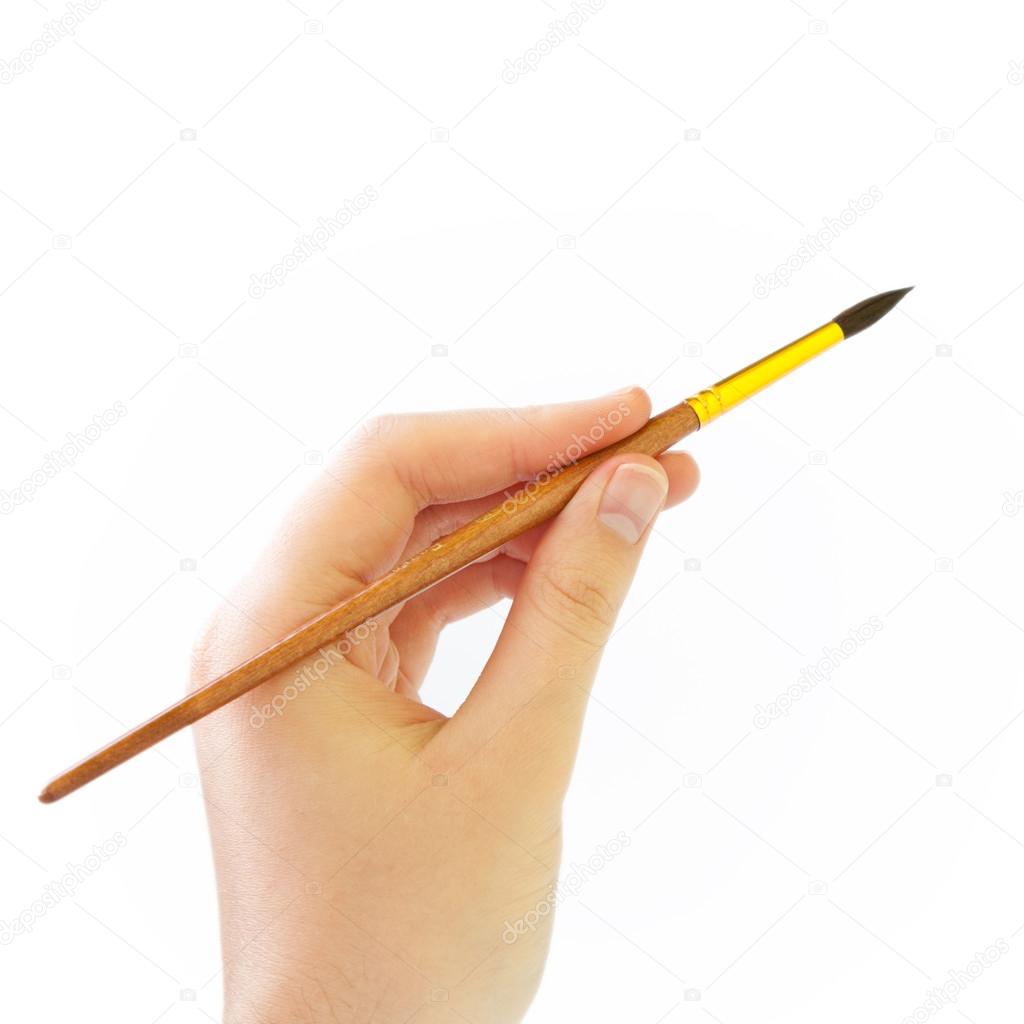 Hand with brush Stock Photo by ©Arcady 73346281