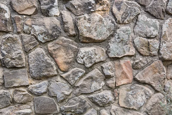 Natural stone masonry, wall made on rock stone — Stock Photo ...