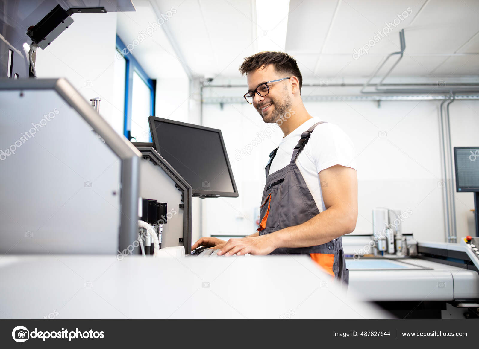 Experienced Mechatronics Engineer Checking Automated Robotic System ...