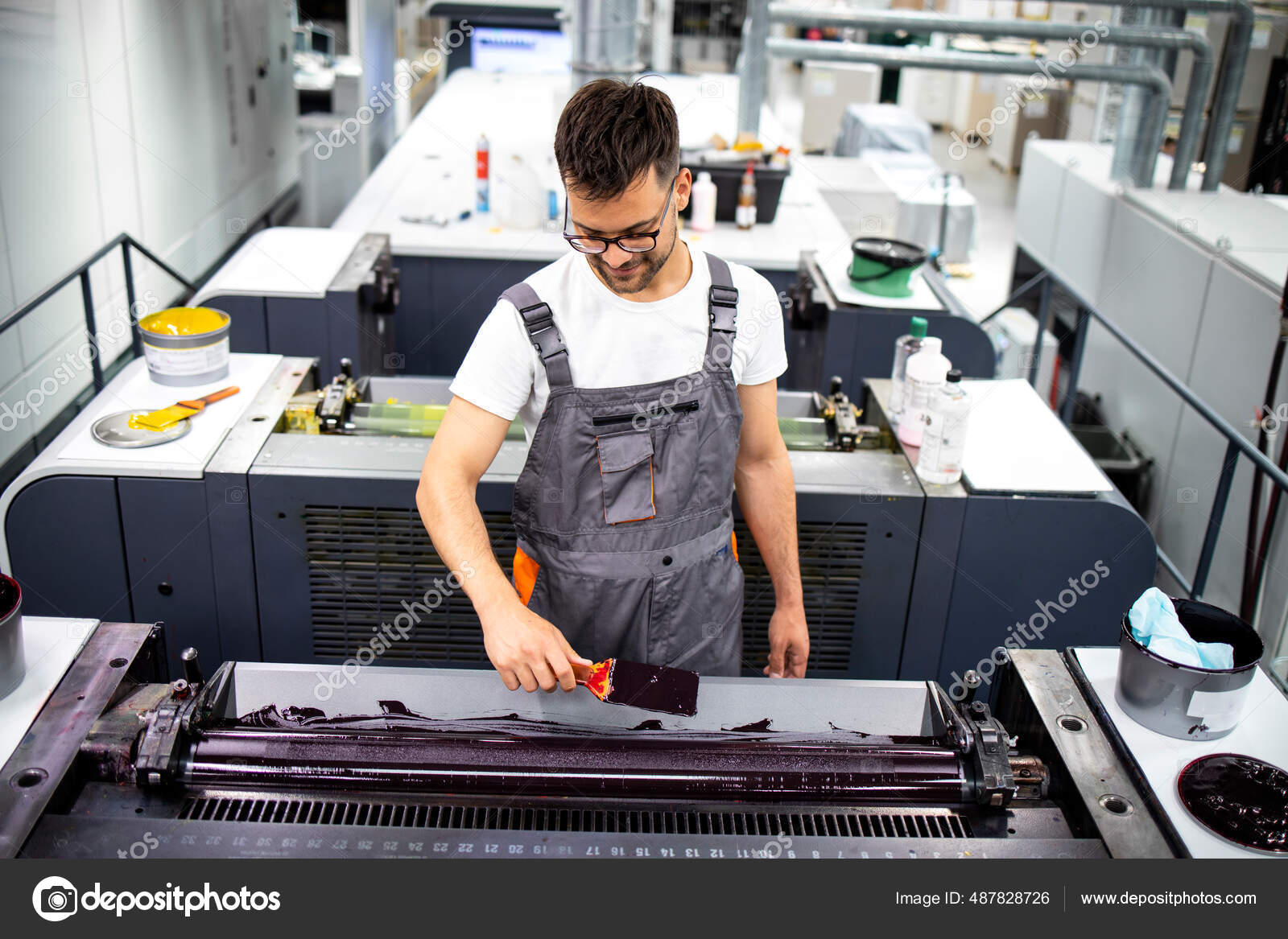 Professional Printing Machine Operator Adding More Color Print Process ...