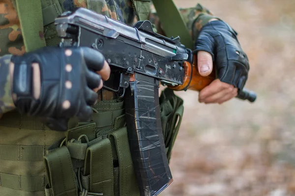 Weapon in the hands of a soldier — Stock Photo © kaninstudio #64572165