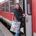 Pretty young woman boarding a train — Stock Photo © lightpoet #17128593