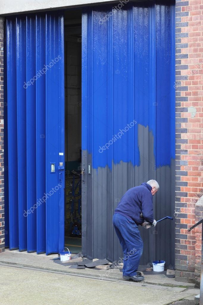 A painter at work Stock Photo by ©1markim 97388838