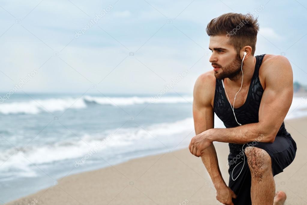 Tired Man Resting After Running On Beach. Sports Workout Outdoor ... Tired Man Resting After Running On Beach. Sports Workout Outdoor ...