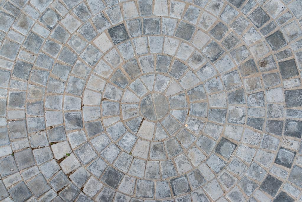 Cobble circular pattern block pavement texture. Top view Stock Photo by ...
