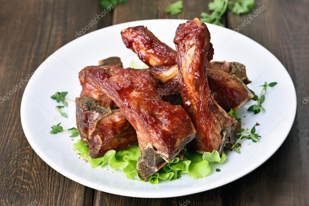 Roasted pork ribs — Stock Photo © voltan1 #74907751