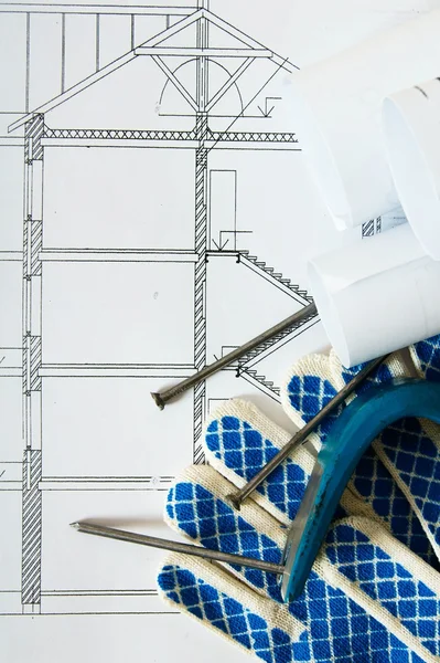 Repair work. Drawings for building, mount and gloves on wooden ...