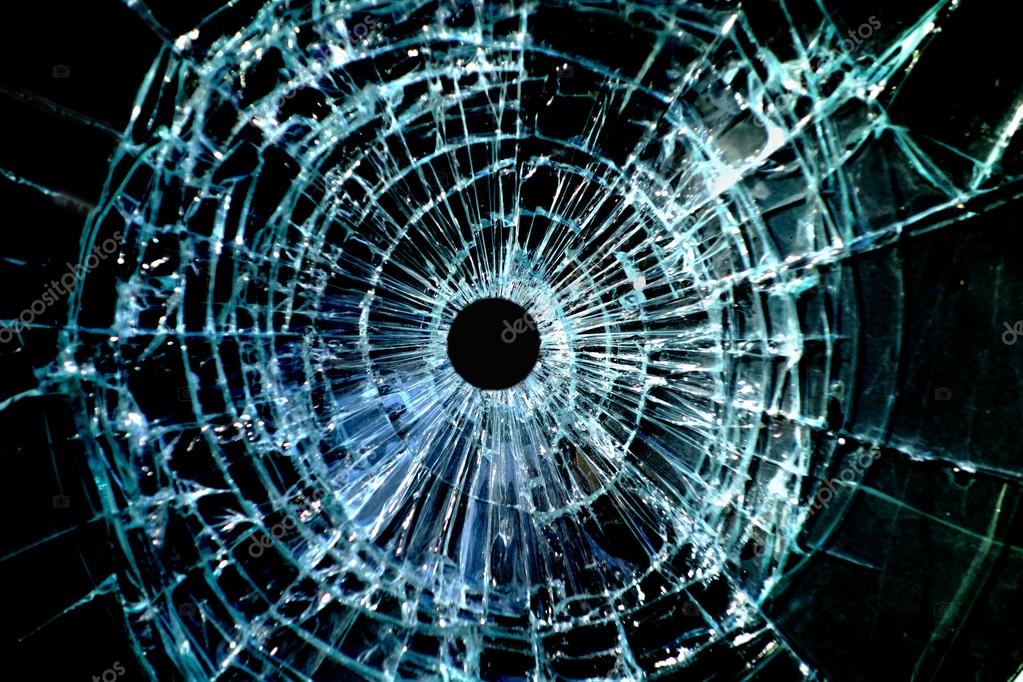 Bullet Hole Through Glass