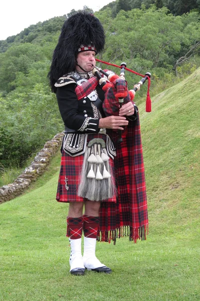 Scottish bagpiper Stock Photos, Royalty Free Scottish bagpiper Images ...