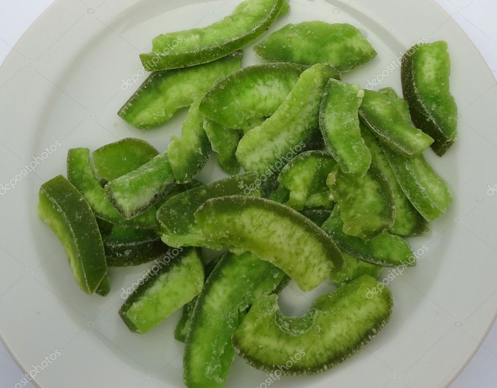 Pomelo confitado (Citrus maxima) rodajas de frutas tiles como concepto ...