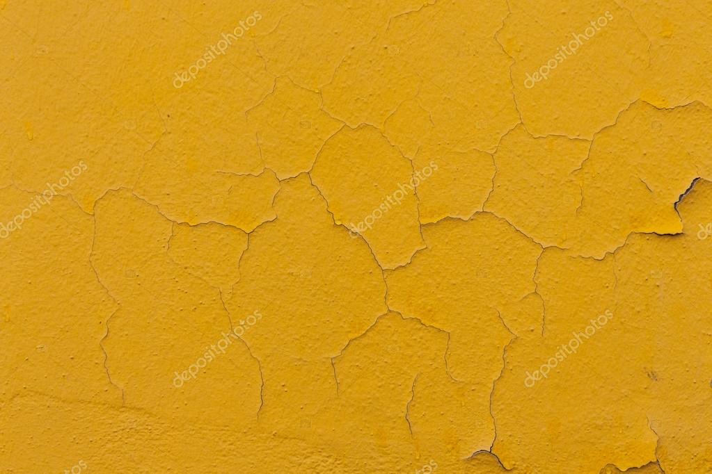 Yellow cracked wall background Stock Photo by ©khoroshkov 124200536