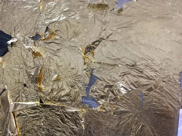 Gold glittering bright yellow metallic gold leaf texture for artistic ...