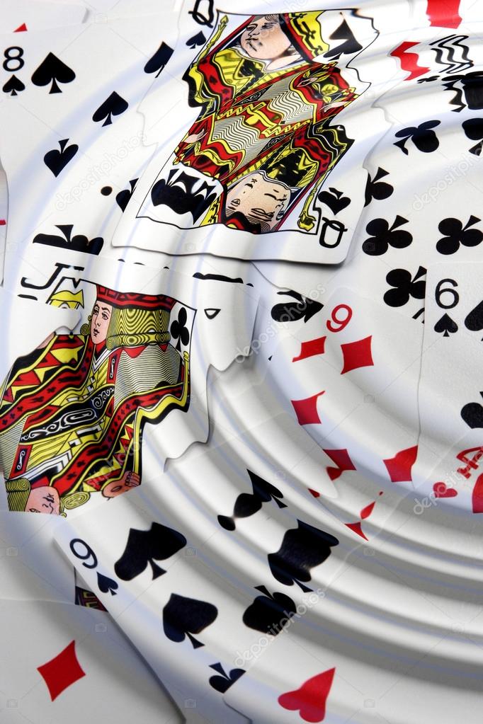 Playing cards in water Stock Photo by ©alancrosthwaite 70285159