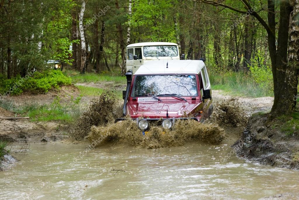 Four wheel drive on muddy track — Stock Editorial Photo ...