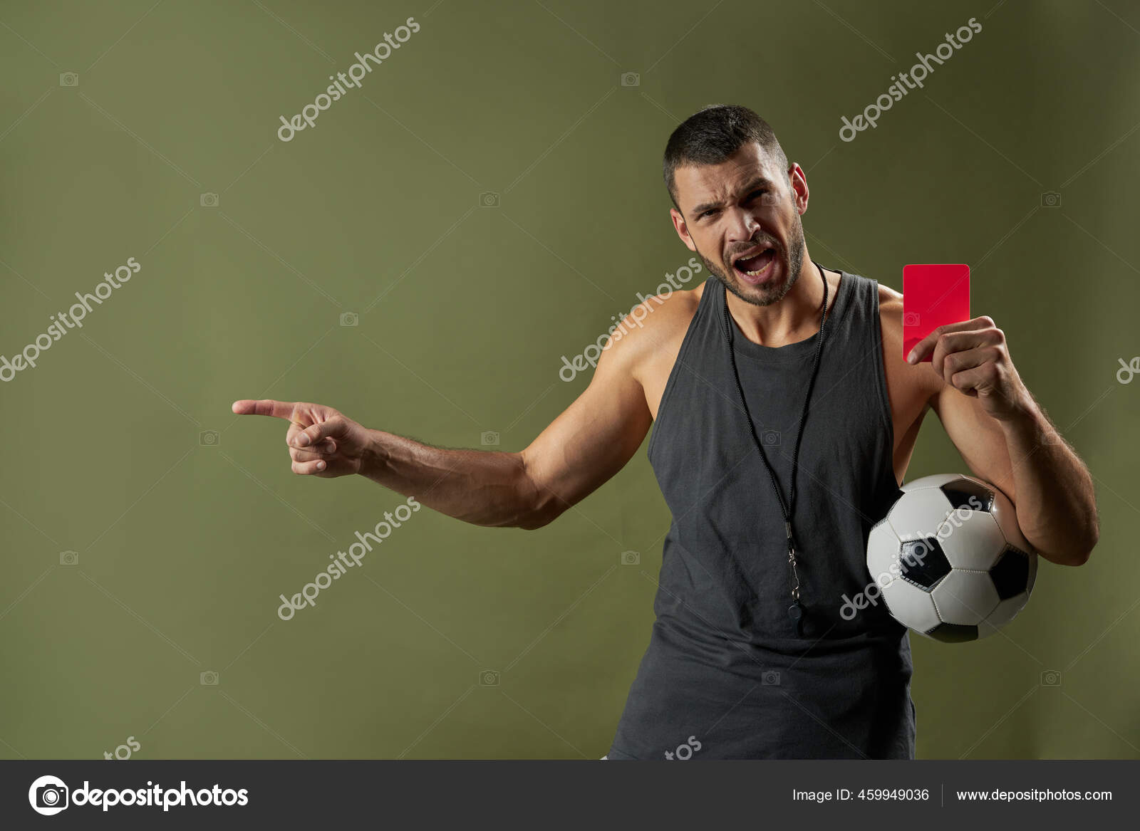 Angry football referee in grey sportswear holding red card in arm ...