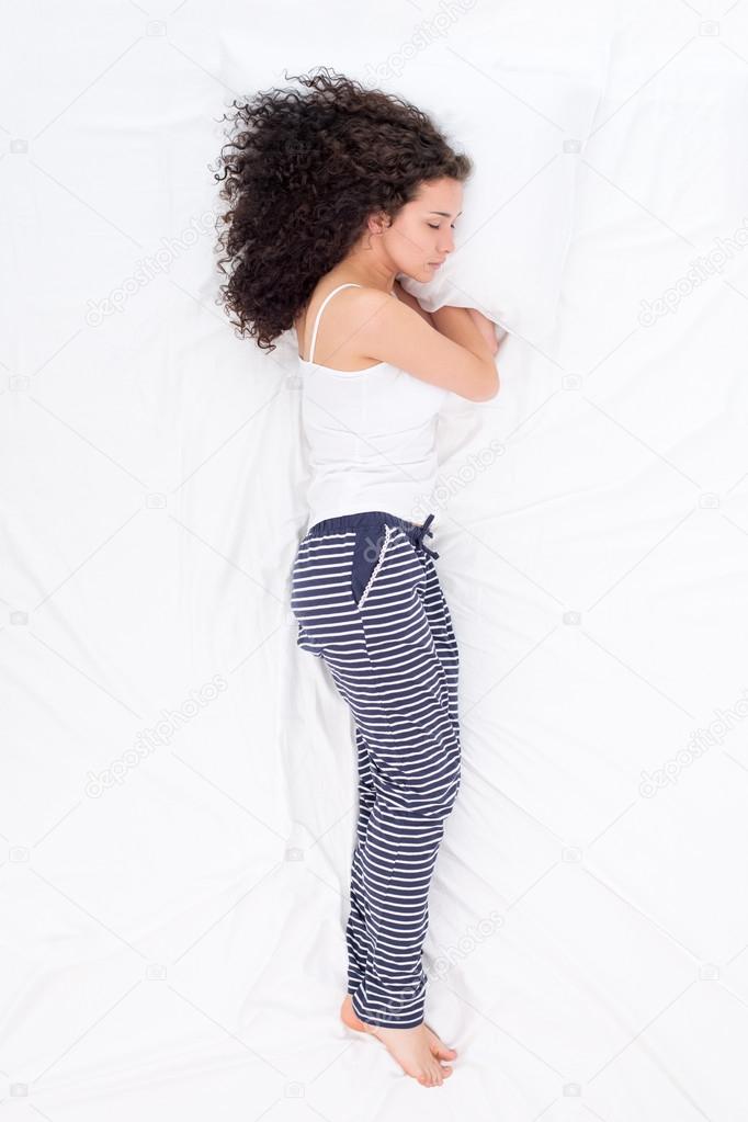 Female sleeping Yearner pose Stock Photo by ©dima_sidelnikov 54488411