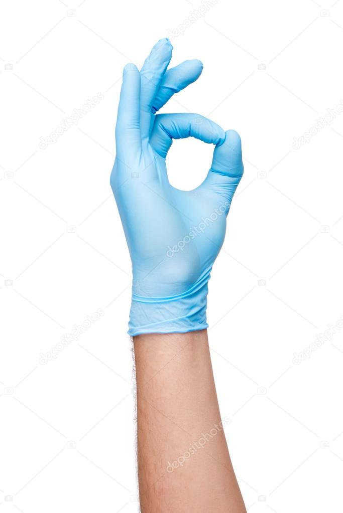 Hand in blue glove showing OK sign Stock Photo by ©dima_sidelnikov 56706231