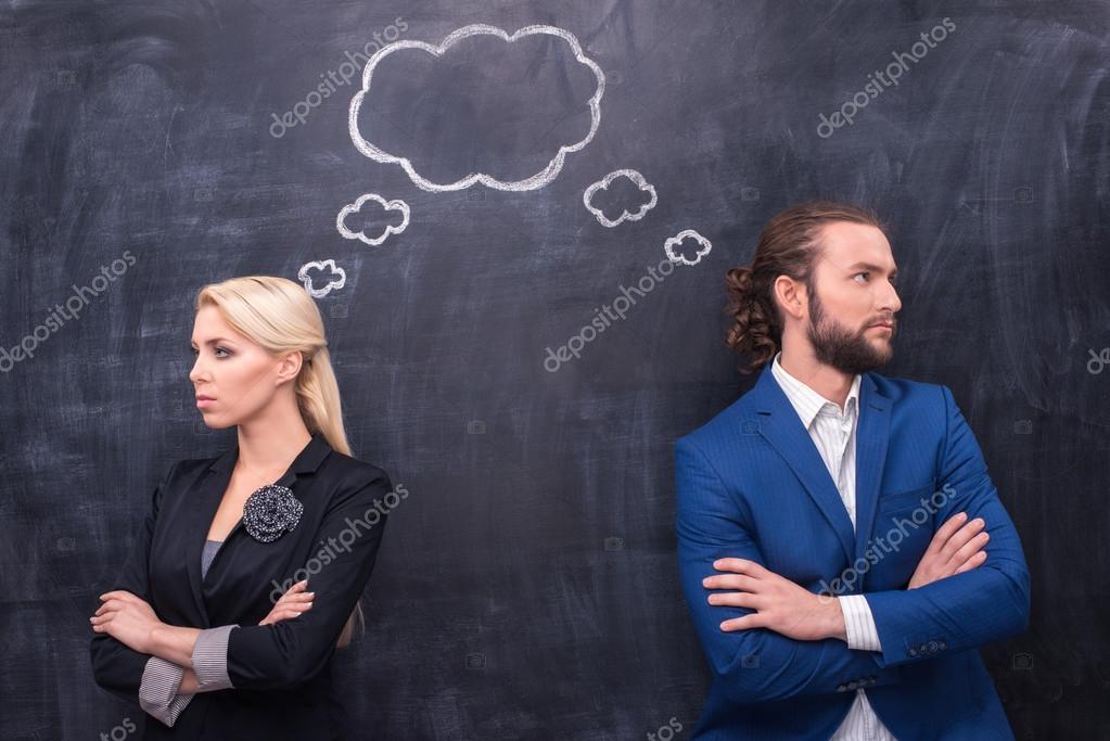 Male and female thinking together on th blackboard background Stock ...