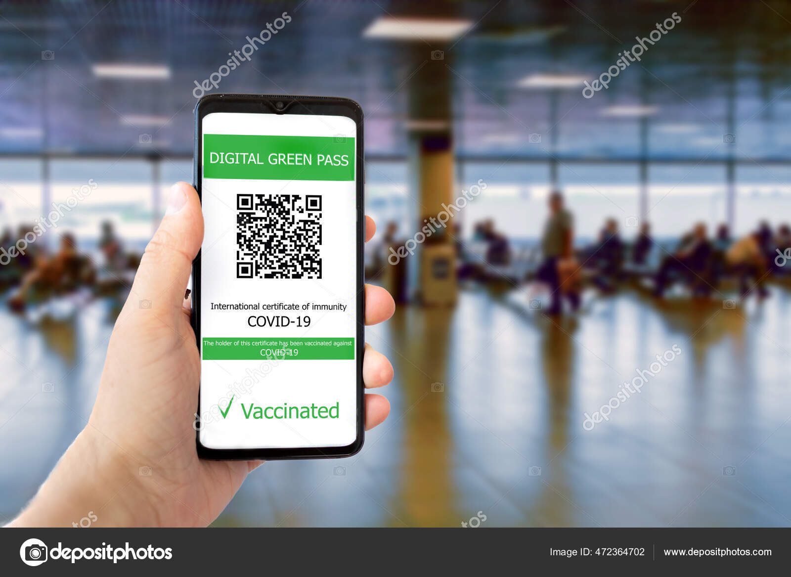 The digital green pass with the QR code on the screen of a mobile in a ...