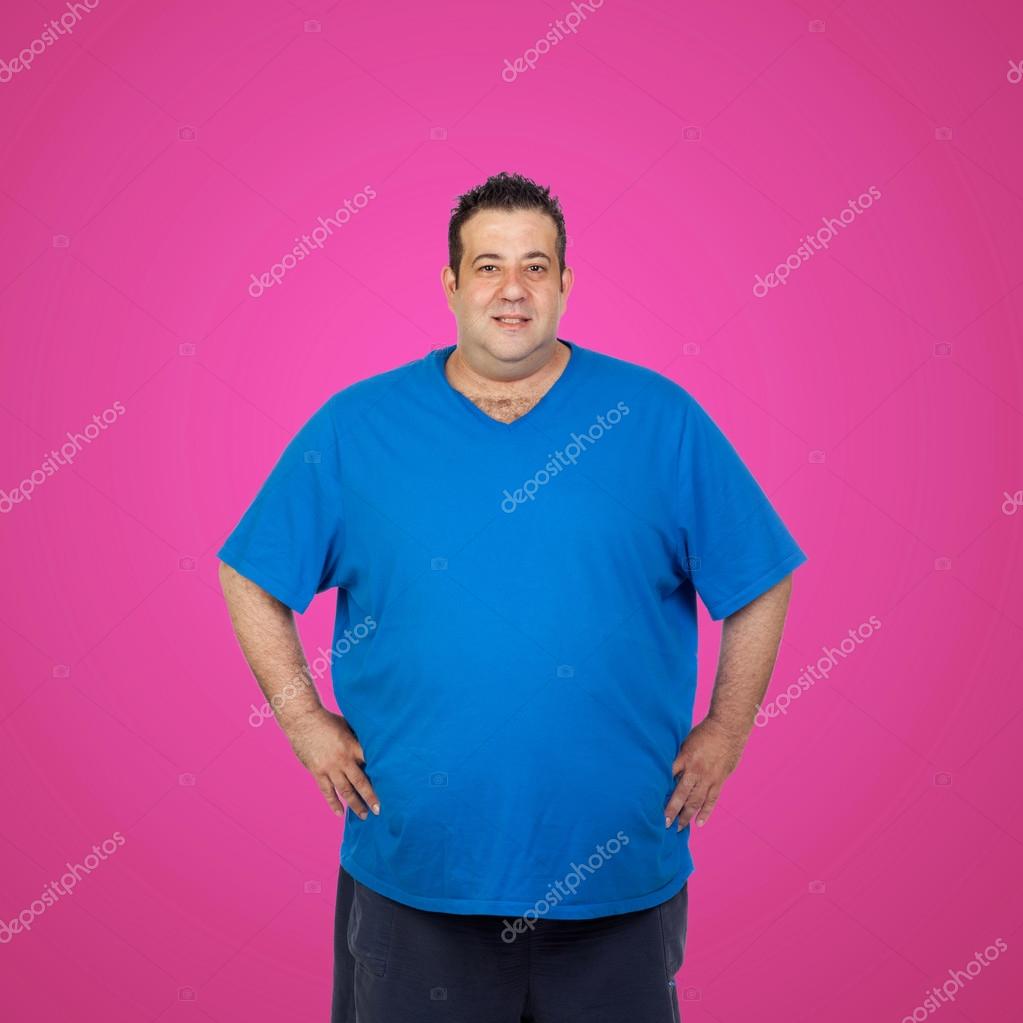 Happy fat man with blue shirt Stock Photo by ©Gelpi 71081319