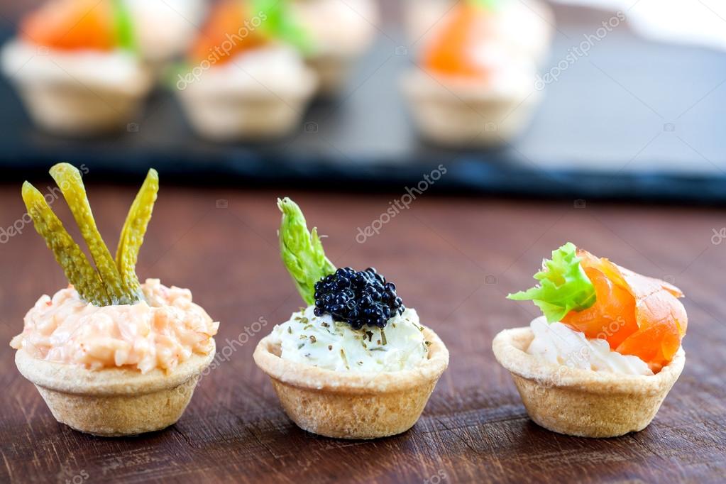 Variety of savory mini pastry tartlets. Stock Photo by ©karelnoppe 88192736