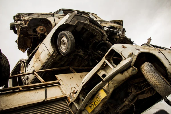 Discarded cars on junkyard – Stock Editorial Photo © valik4053022 #62010351