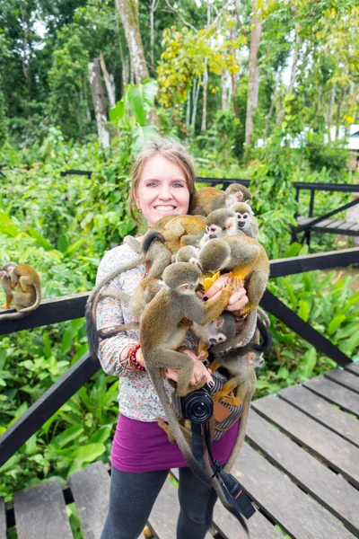 Mujer de mono ardilla Stock Photos, Royalty Free Mujer de mono ardilla ...