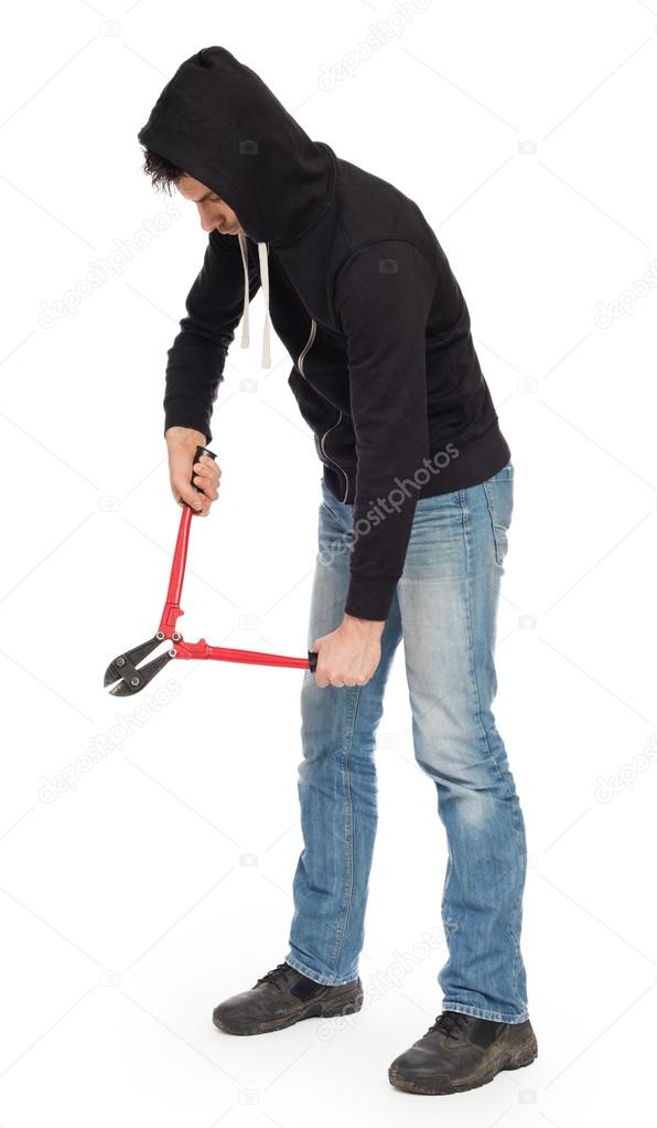 Robber with red bolt cutters Stock Photo by ©michaklootwijk 107111568