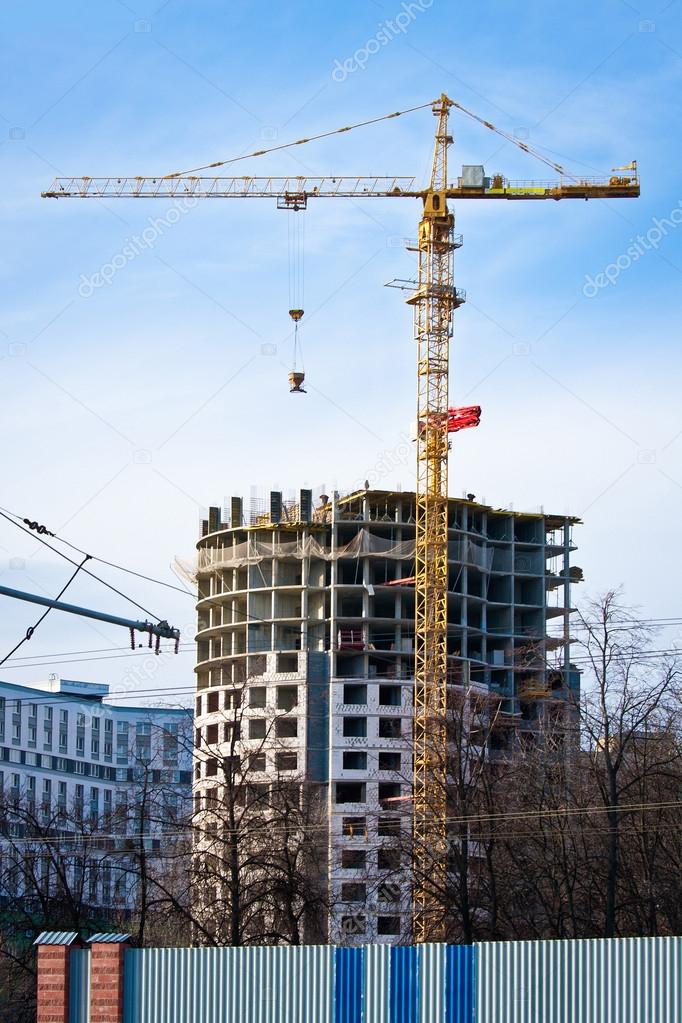 Tower crane and reinforced building Stock Photo by ©zestmarina 79125750