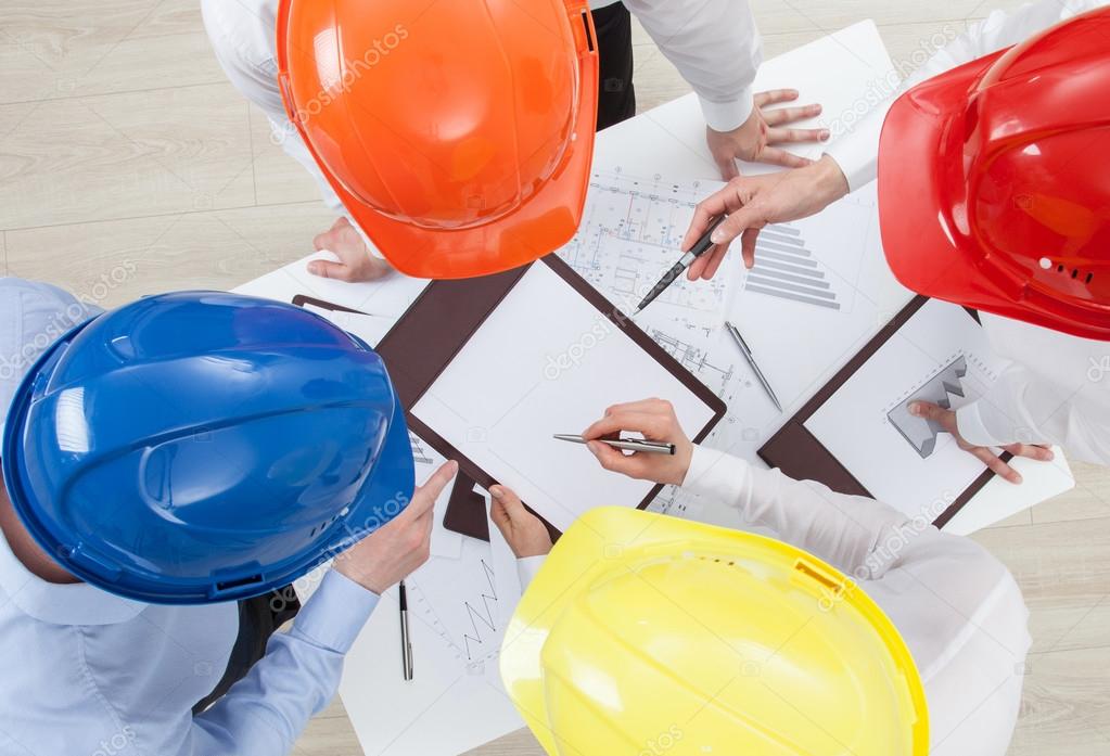 Group discussion in a construction company Stock Photo by ©zestmarina ...
