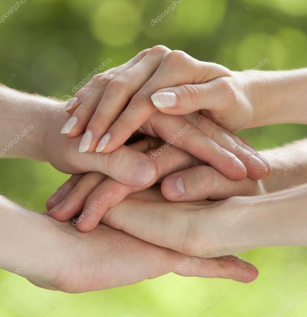 Hands connected together Stock Photo by ©zestmarina 90164654
