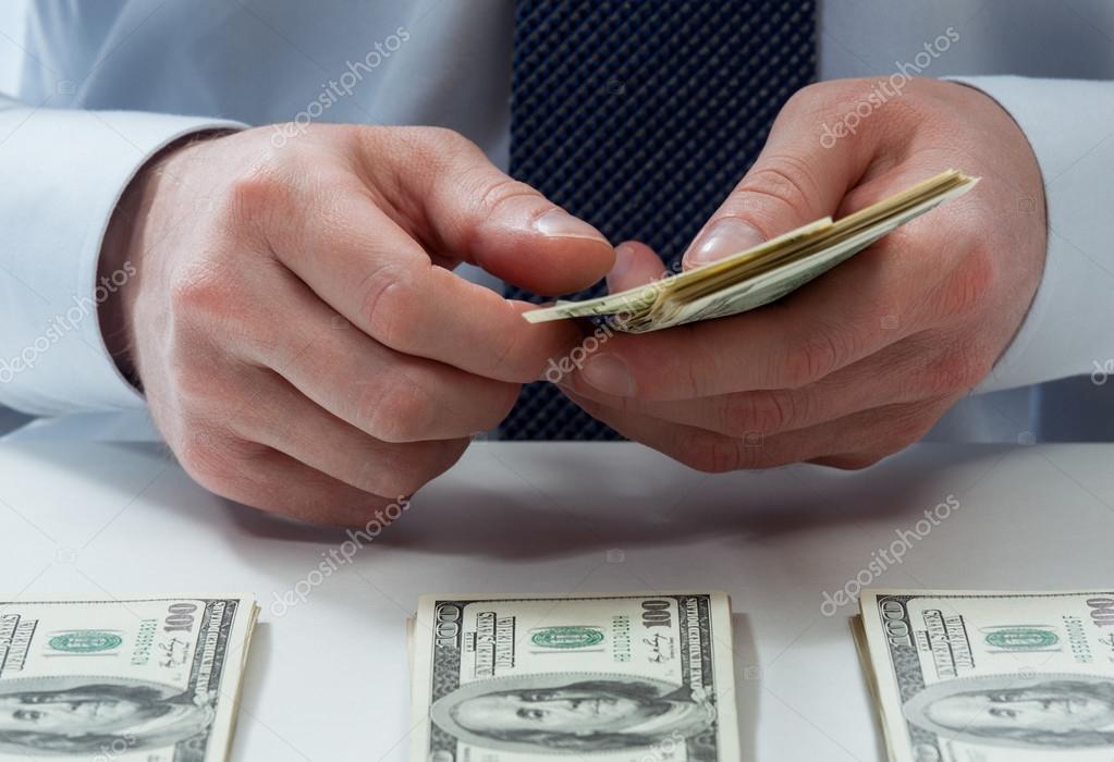 Cajero contando billetes en dólares: fotografía de stock © zestmarina ...