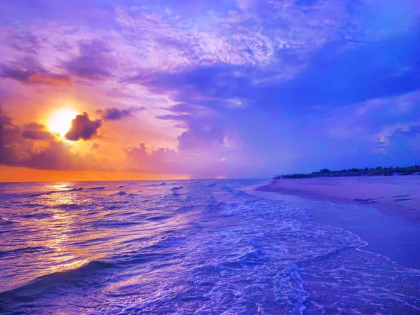 Beach sunset purple Stock Photos, Royalty Free Beach sunset purple ...