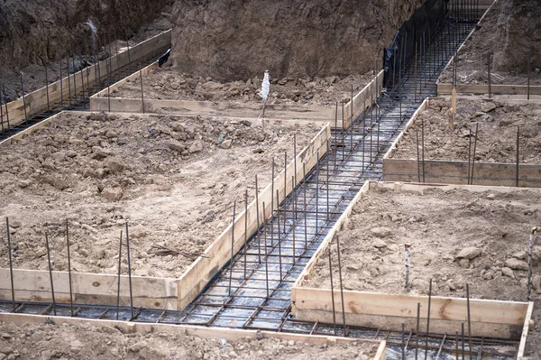 The beginning of the construction of the house with the preparation of ...