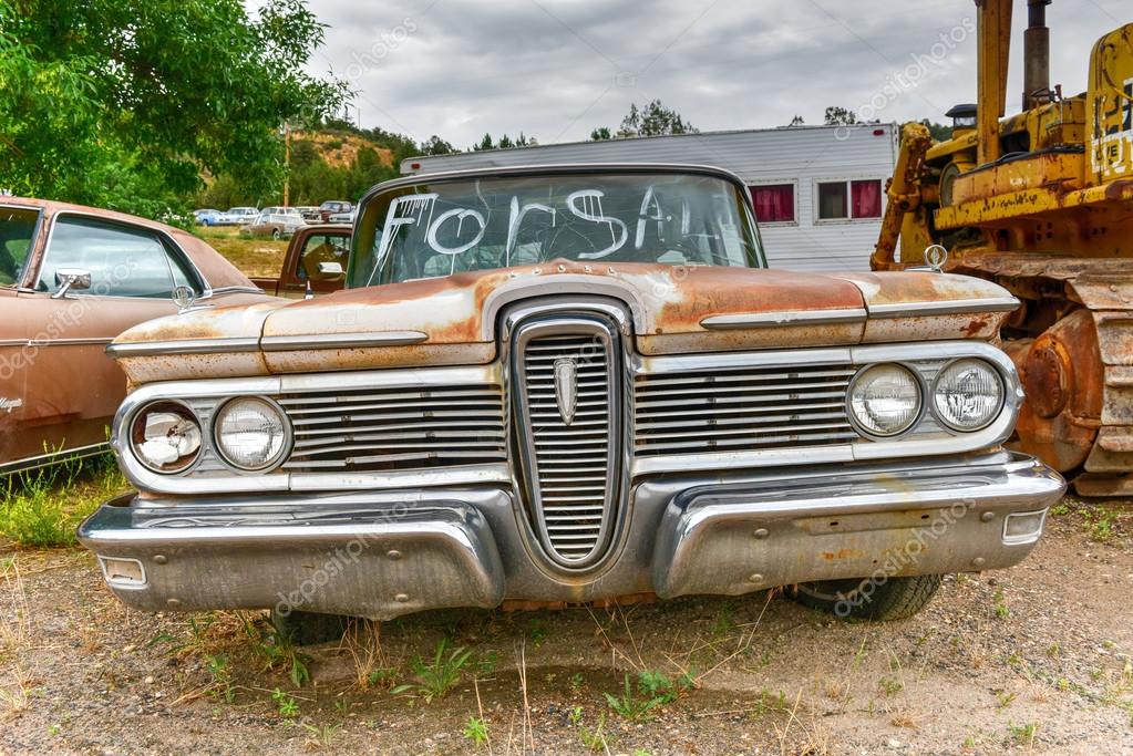 Rusting Car in Junk Yard – Stock Editorial Photo © demerzel21 #119133410
