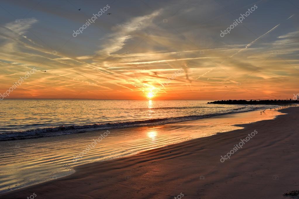 Coney Island Beach at Sunset. — Stock Photo © demerzel21 #64406315