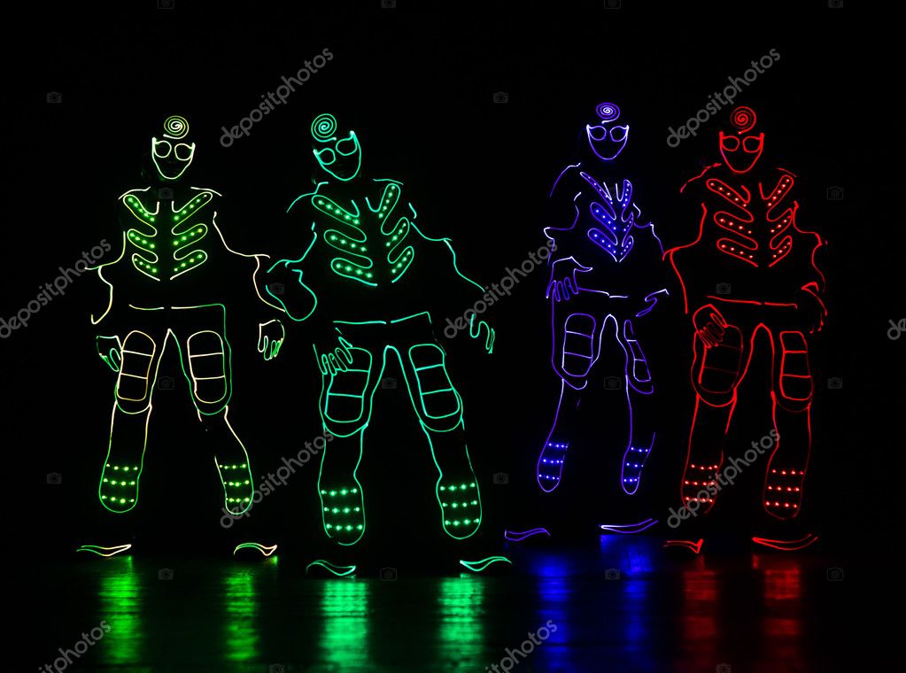 Dance team in costumes of the LEDs Stock Photo by ©VlaDee 110033414