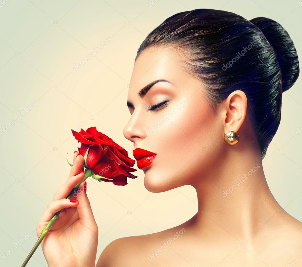 Girl face portrait with red rose Stock Photo by ©Subbotina 123319990