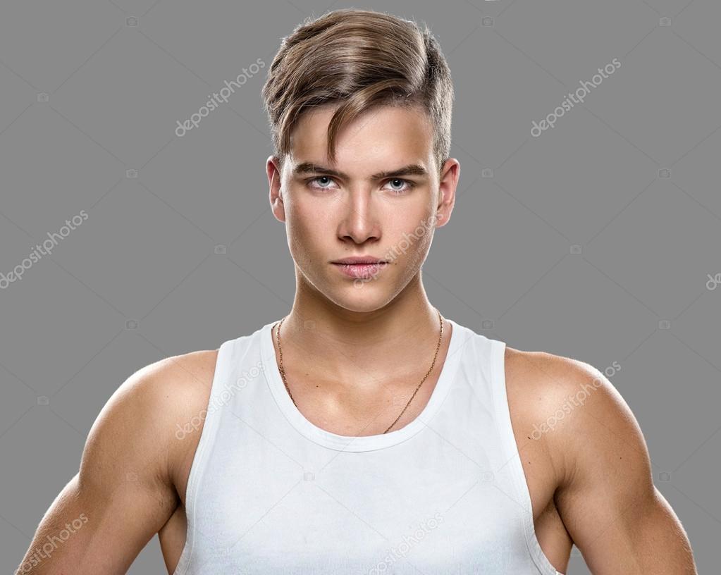 Handsome athletic young man Stock Photo by ©Subbotina 90109590